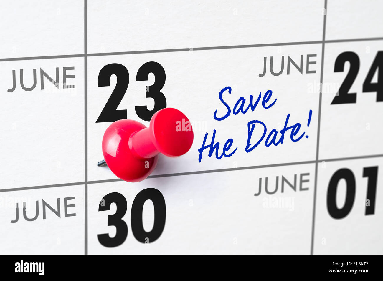 Wall calendar with a red pin - June 23 Stock Photo - Alamy