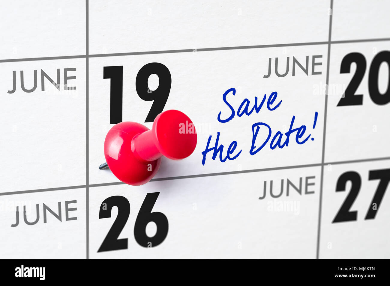 Wall calendar with a red pin - June 19 Stock Photo - Alamy