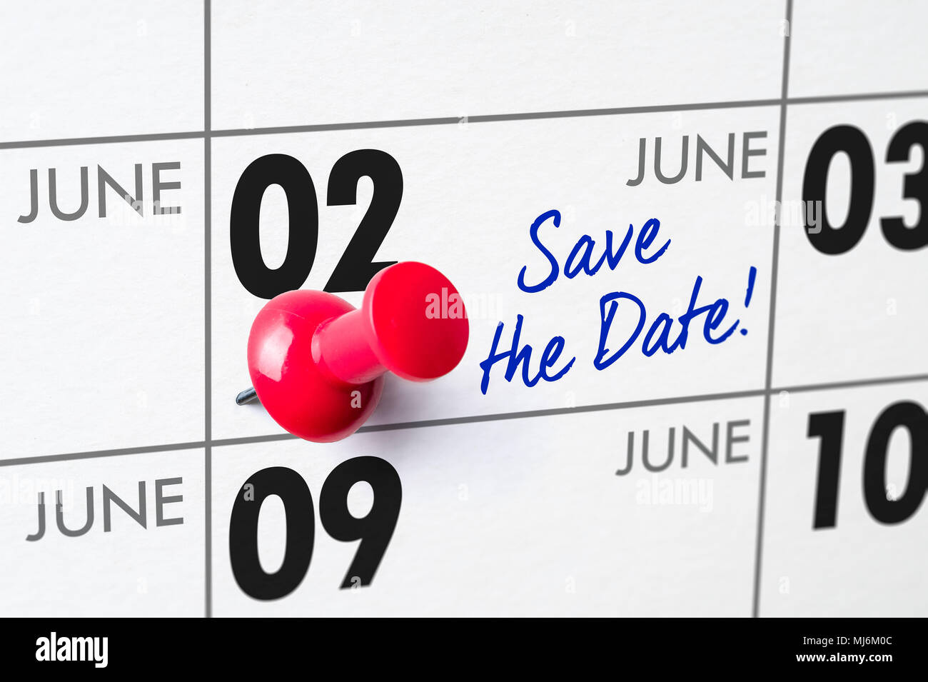 Wall calendar with a red pin - June 02 Stock Photo - Alamy