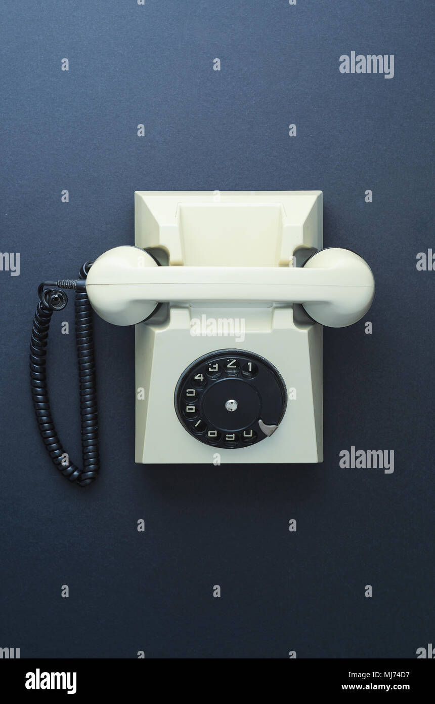 Retro rotary phone over black background, above view Stock Photo - Alamy