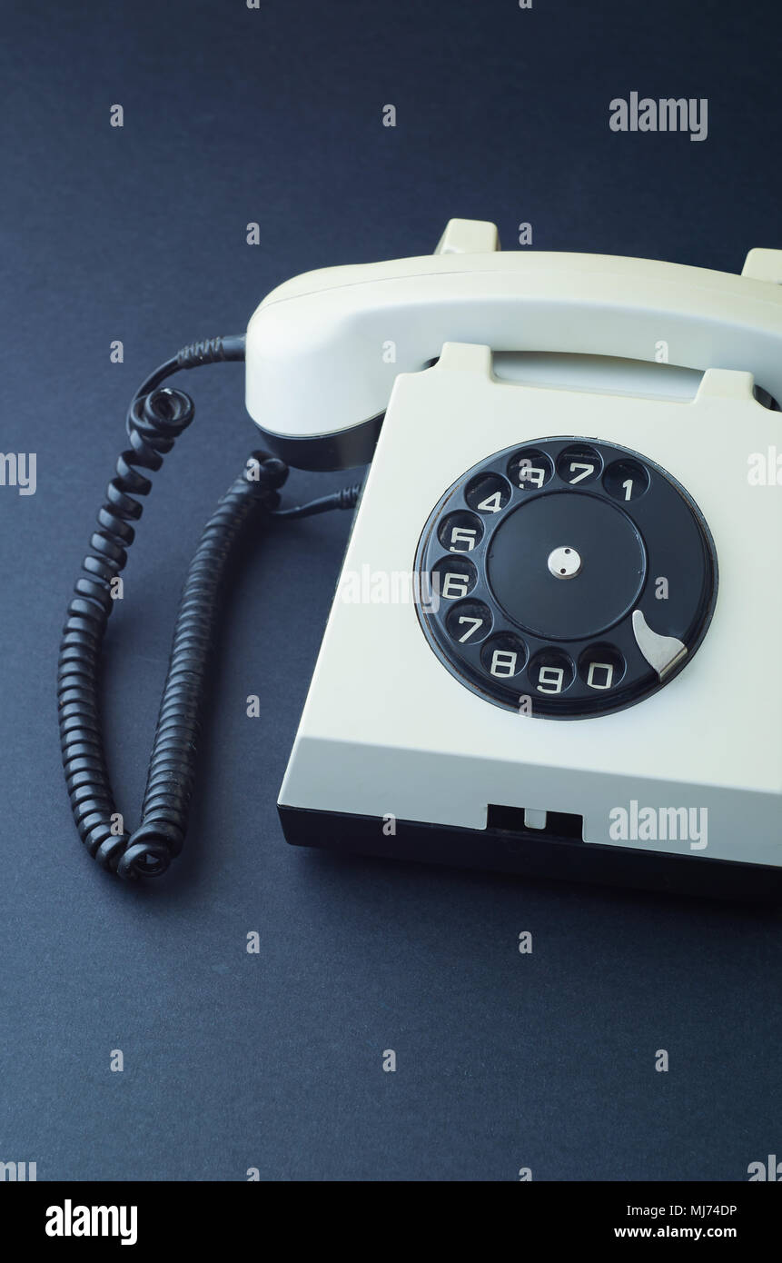 Retro rotary phone close up over black background, above view Stock ...