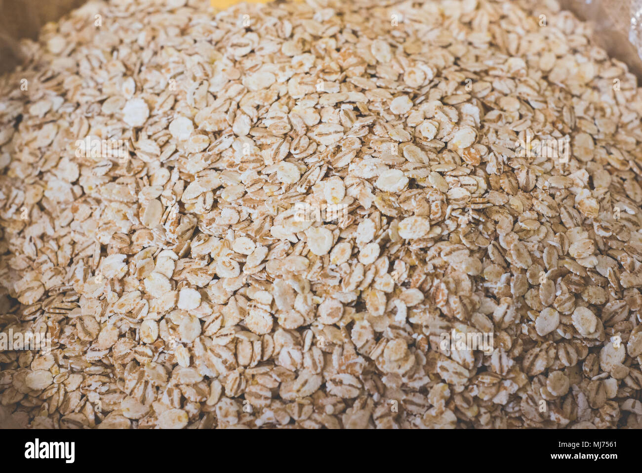 close up photo of natural barley flakes Stock Photo - Alamy