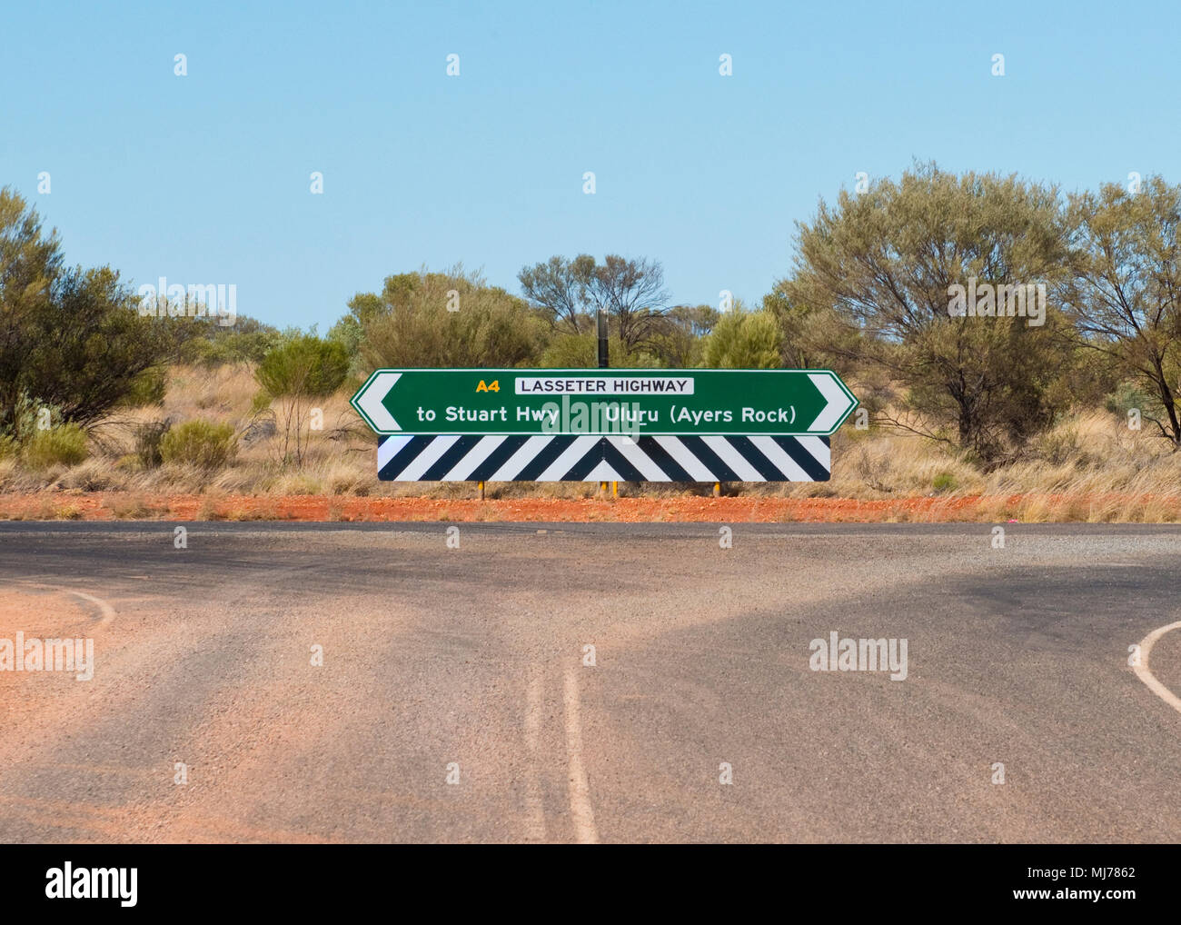 Lasseter Highway road sign directions to Stuart Highway and Uluru ...