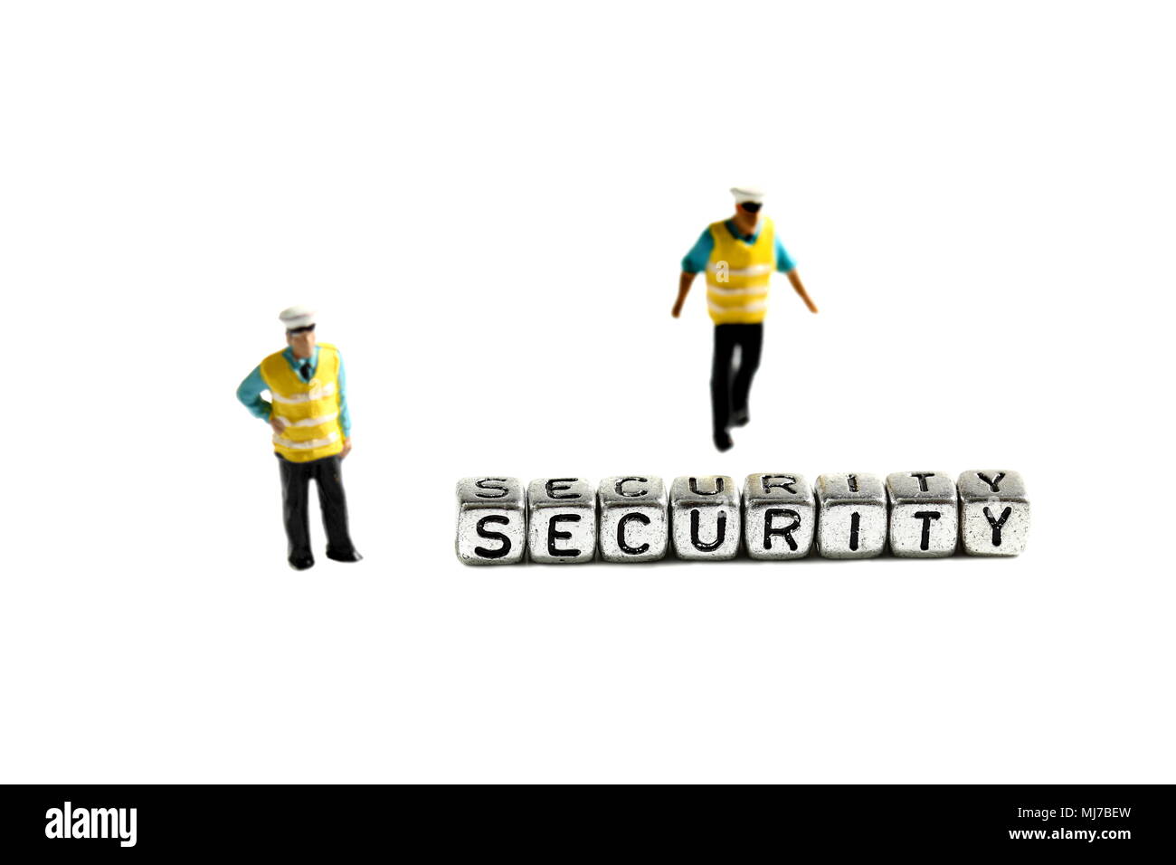 Security on beads with miniature scale model security guards isolated ...