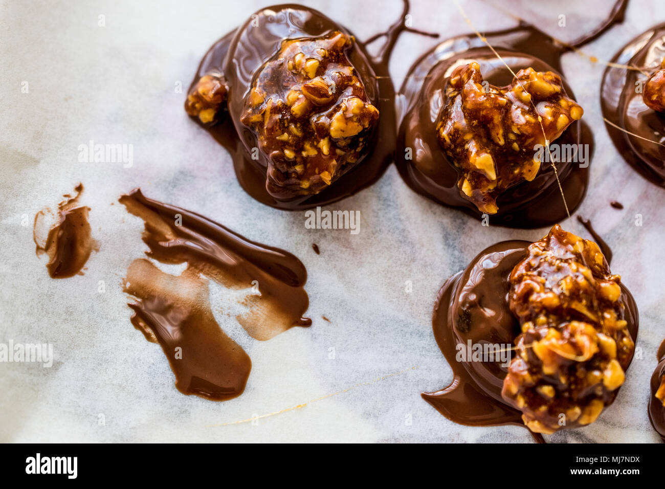 Praline Chocolate with walnut, almond, peanut or croquant. Organic ...