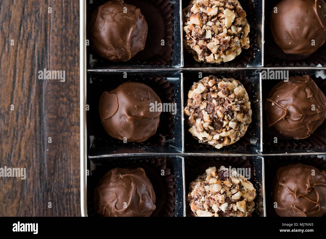 Box of Chocolate Pralines with Hazelnuts. Dessert Concept Stock Photo ...