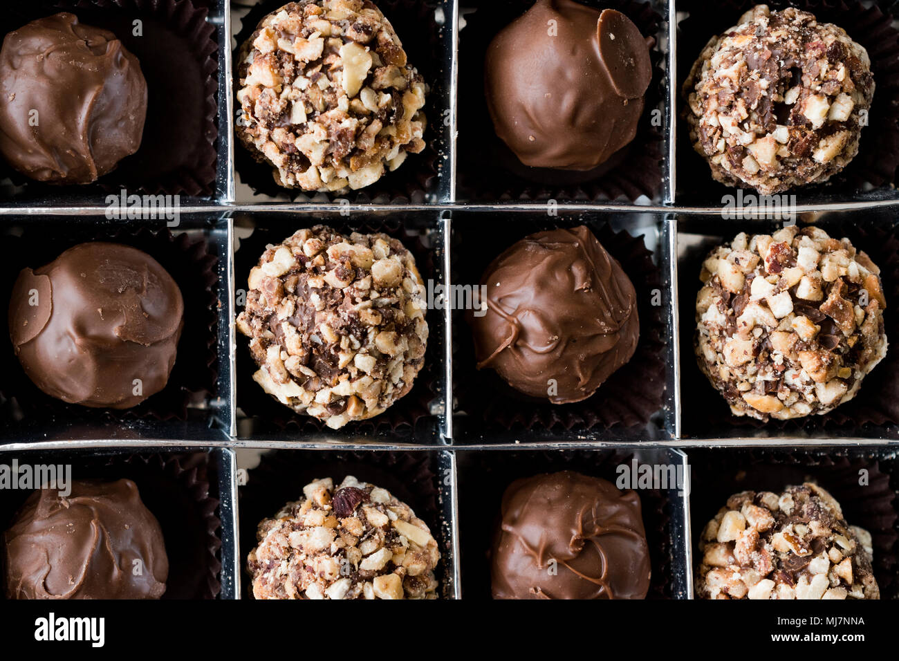 Box of Chocolate Pralines with Hazelnuts. Dessert Concept Stock Photo ...