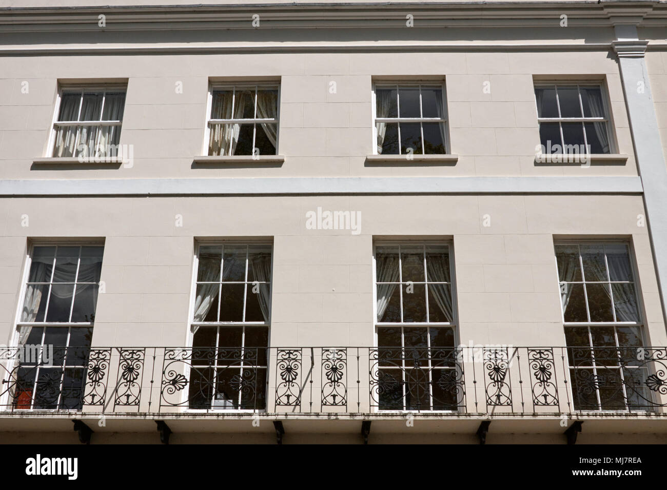 Regency housing windows and ironwork in Cheltenham, Gloucestershire ...