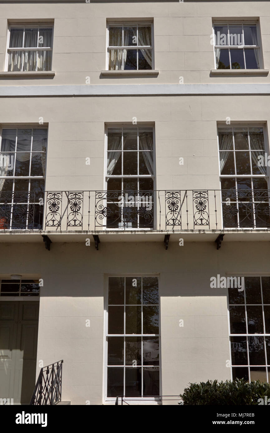Regency housing windows and ironwork in Cheltenham, Gloucestershire ...