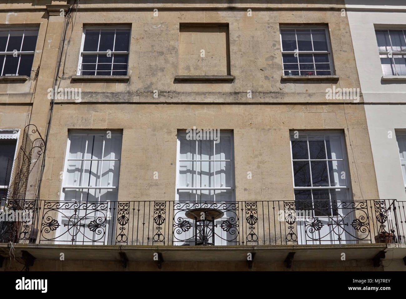 Regency housing windows and ironwork in Cheltenham, Gloucestershire ...