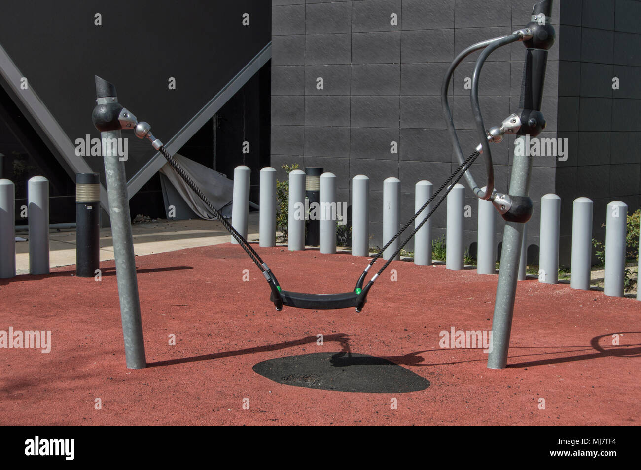 Swings playground hi-res stock photography and images - Alamy