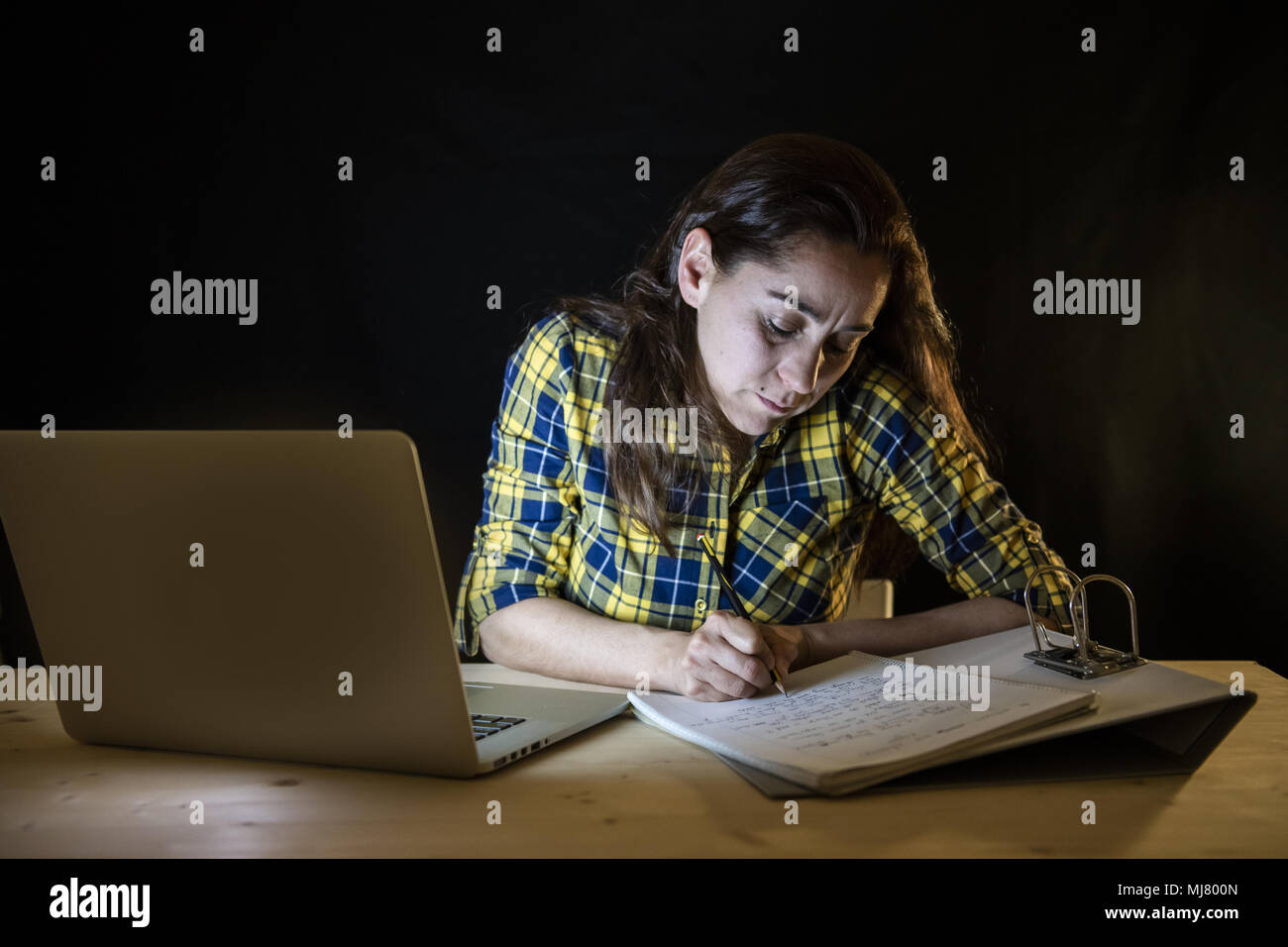 Student studying late night hi-res stock photography and images - Alamy