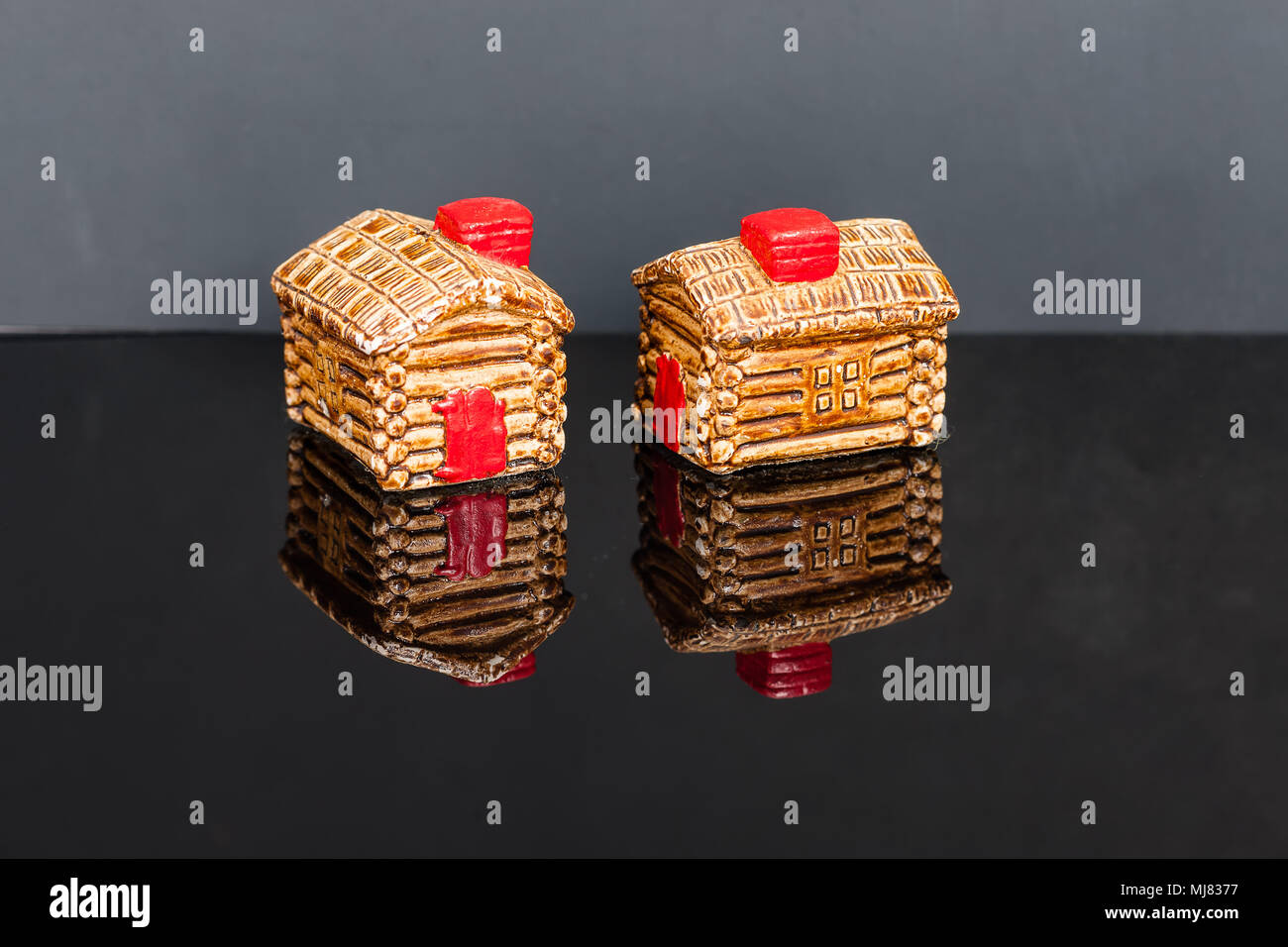 ceramic log cabins salt and pepper shaker set Stock Photo - Alamy