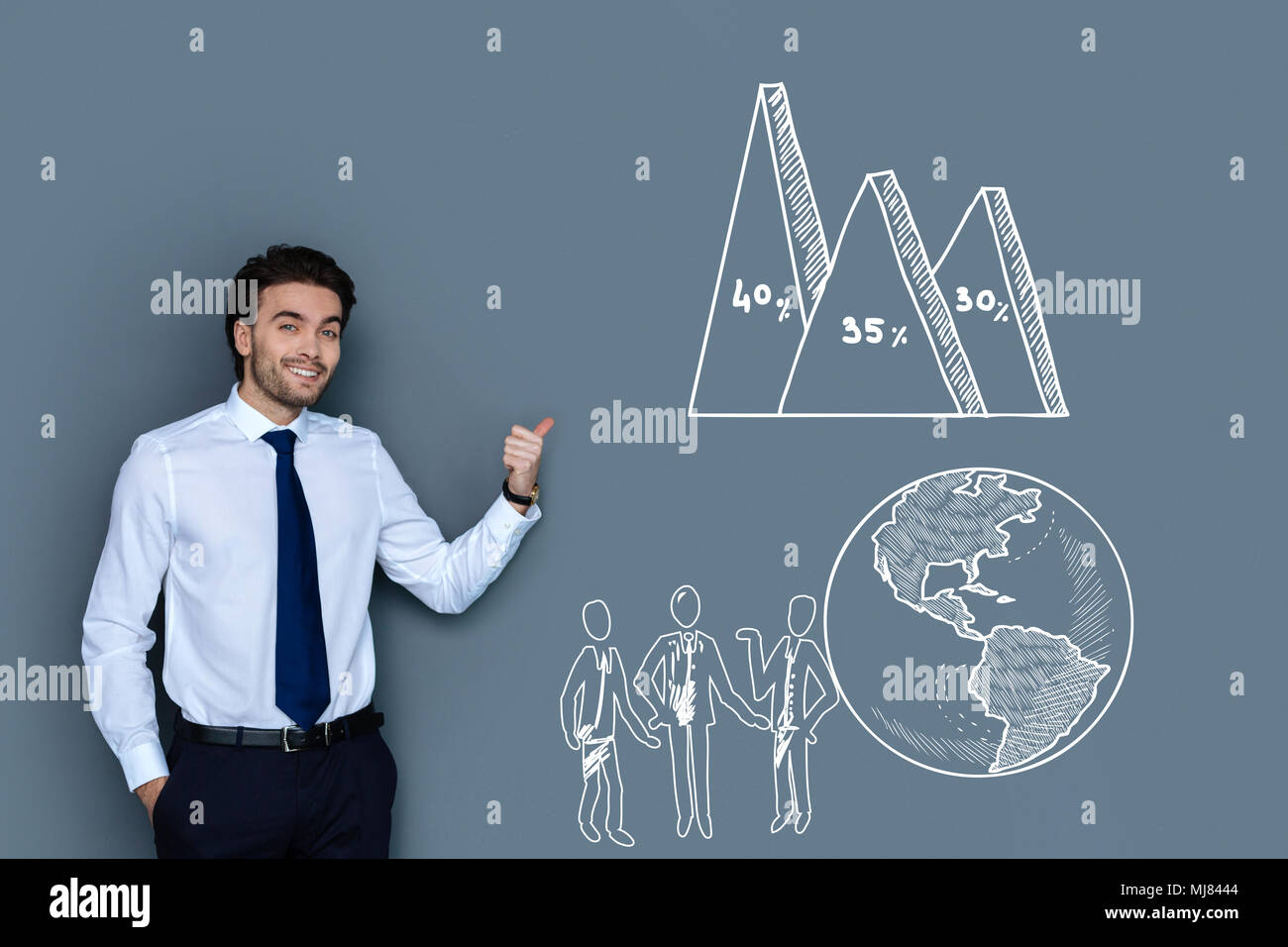 Clever businessman smiling while talking about his success Stock Photo ...