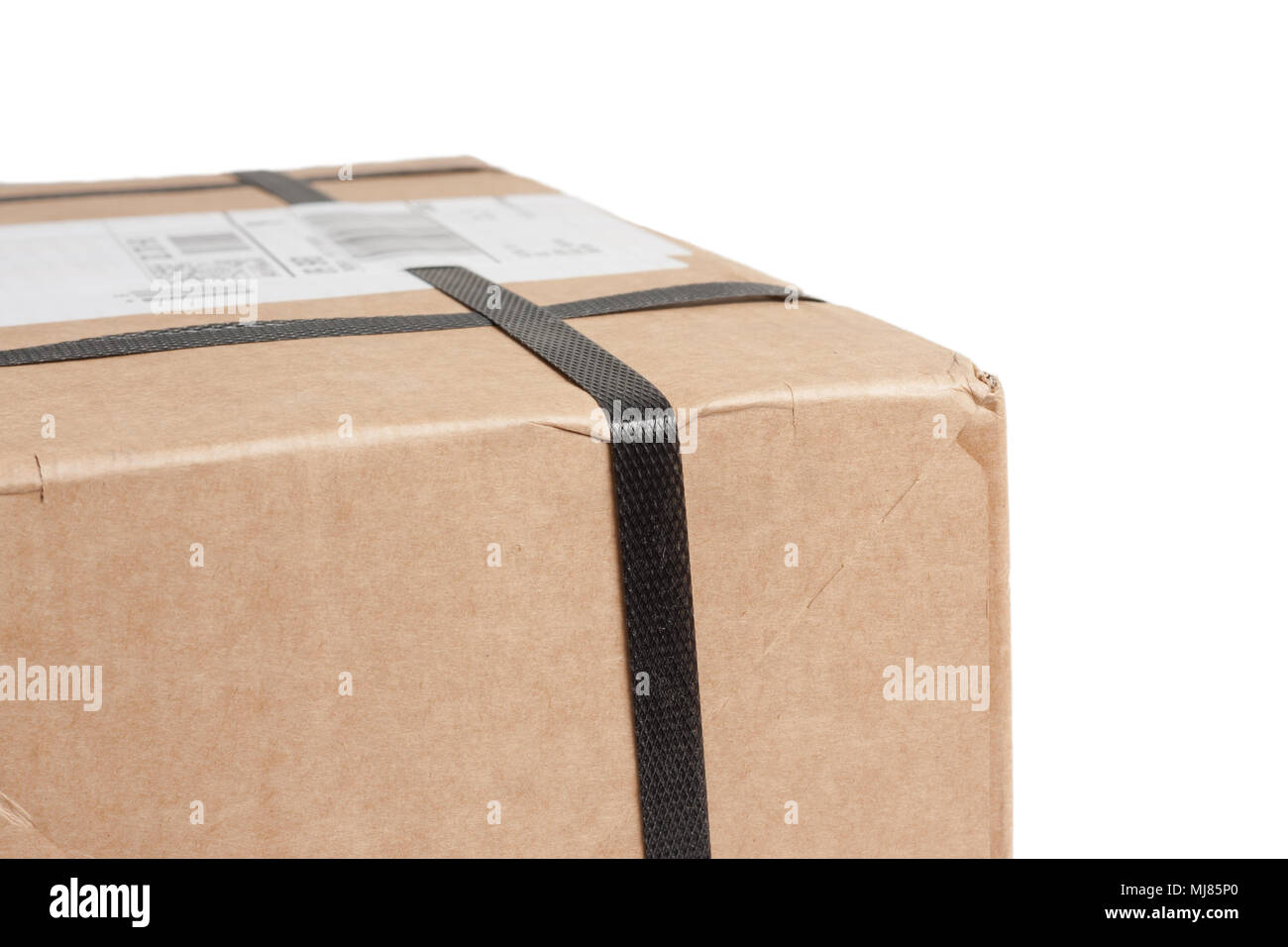 Parcel with strapping isolated on white background Stock Photo - Alamy