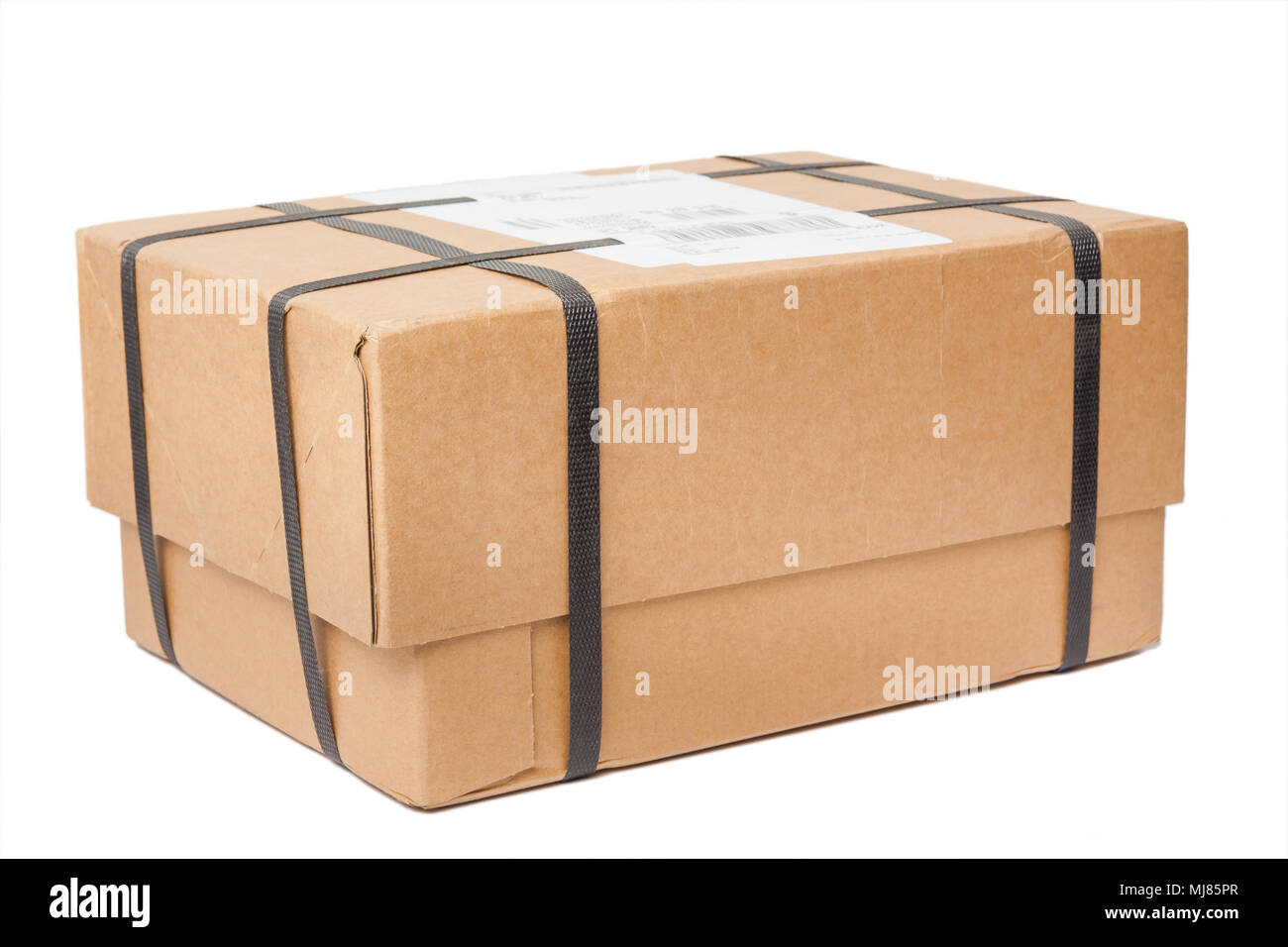 Parcel with strapping isolated on white background Stock Photo - Alamy