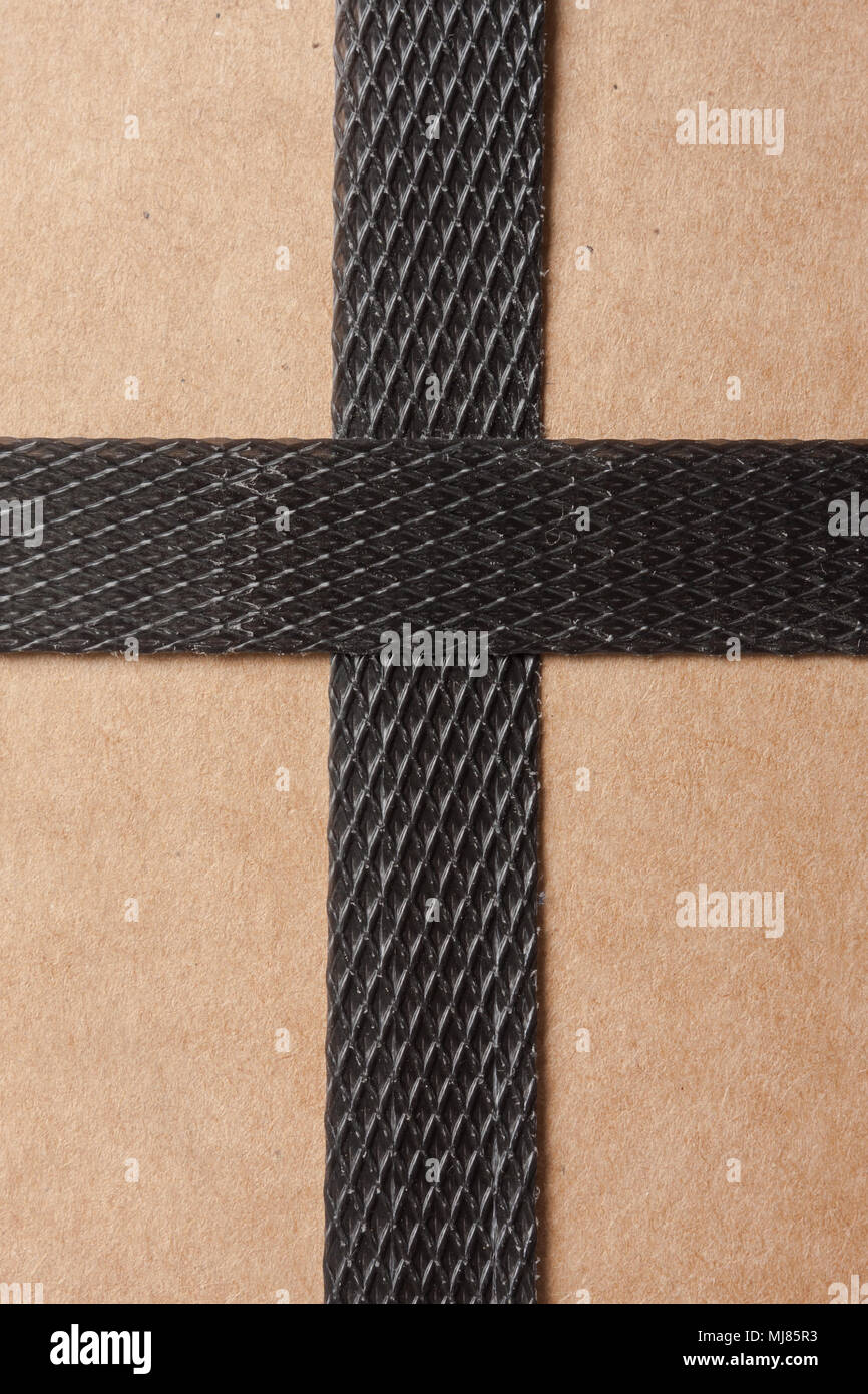 Cardboard with strapping Stock Photo - Alamy