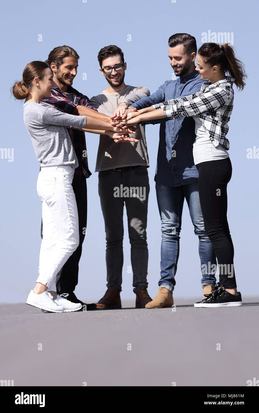 group of young people shows their unity Stock Photo - Alamy