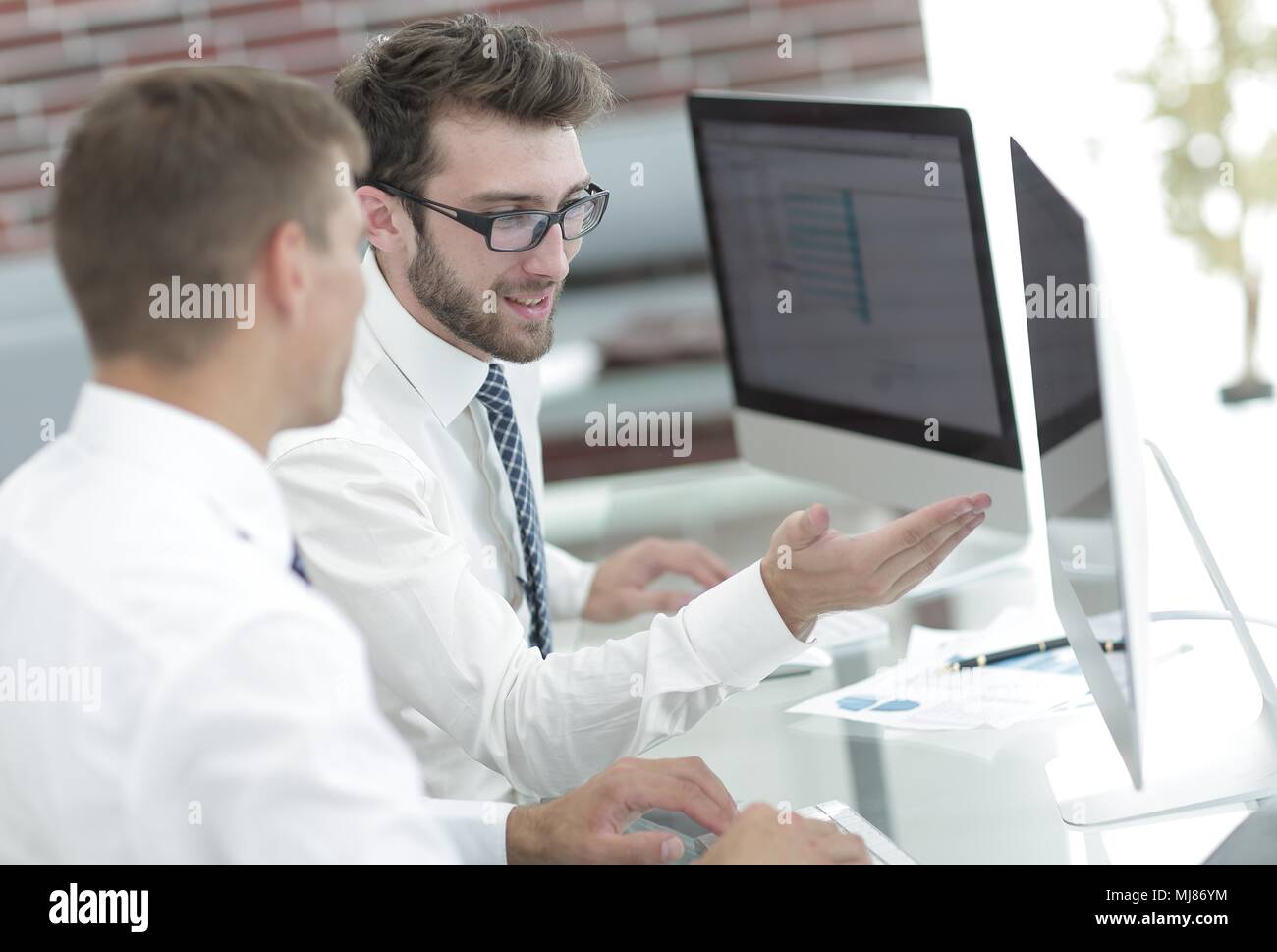 Group experienced employees workplace hi-res stock photography and ...