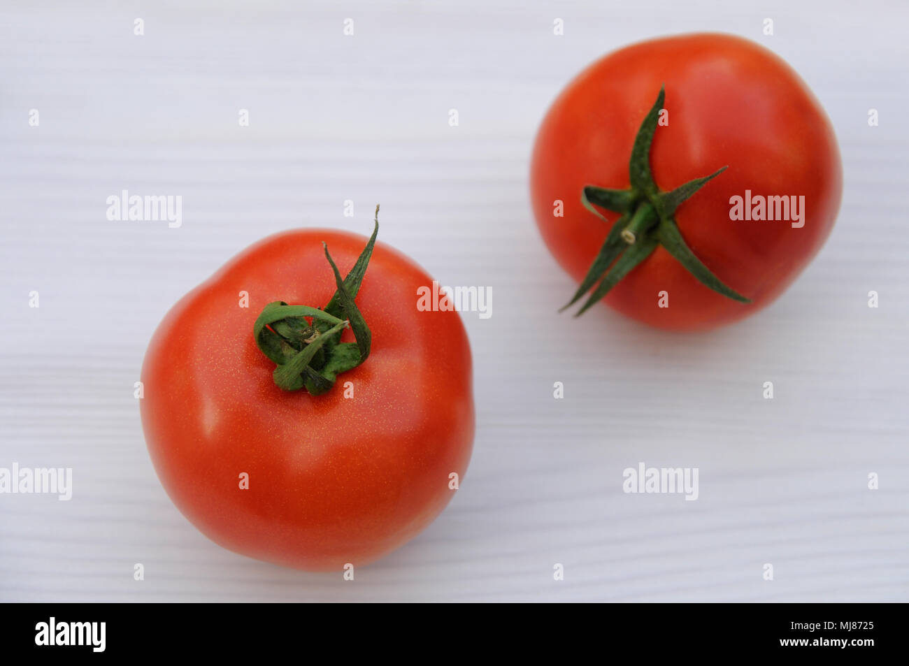 Ripe juicy red tomatoes on hi-res stock photography and images - Alamy