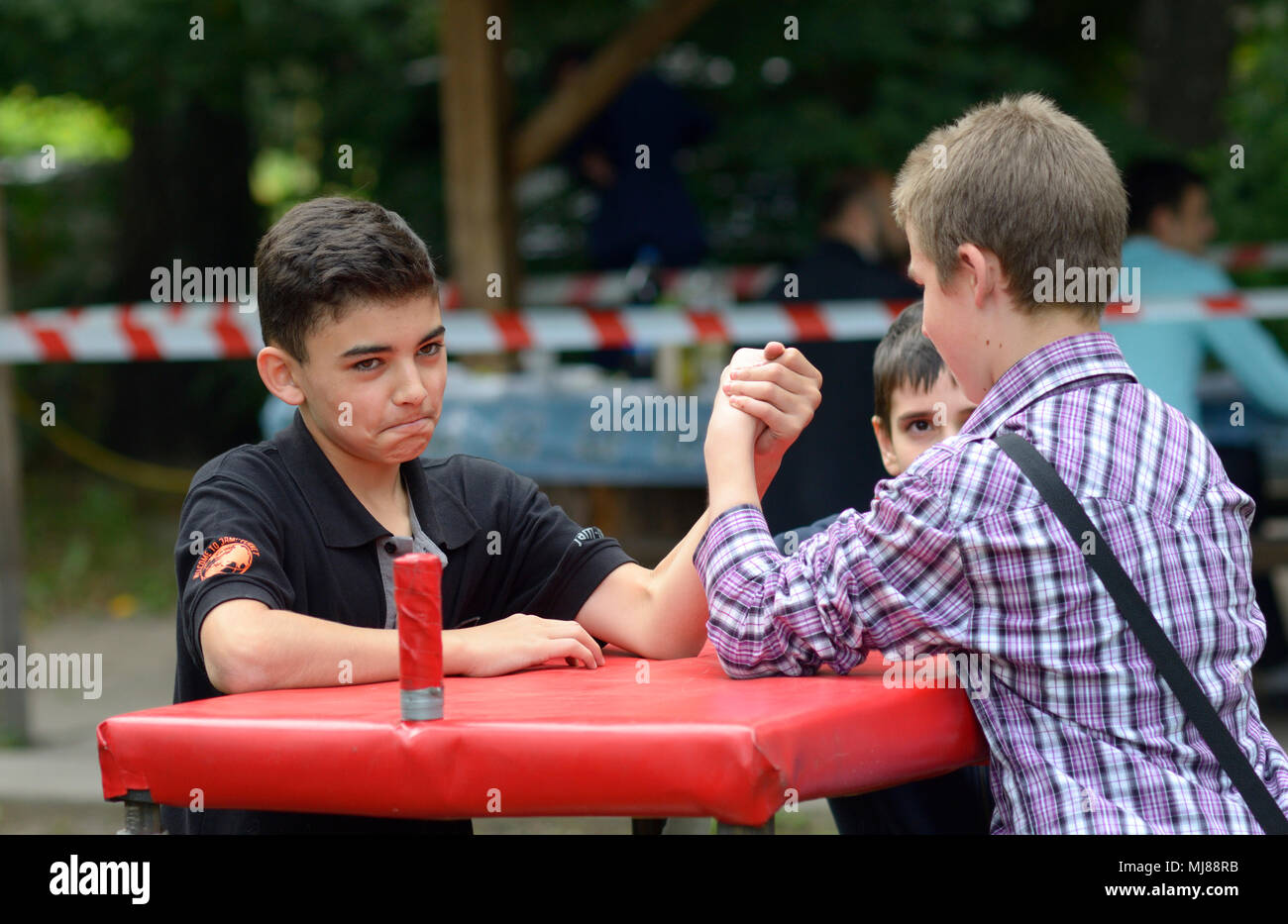 Boy arm wrestling hi-res stock photography and images - Alamy