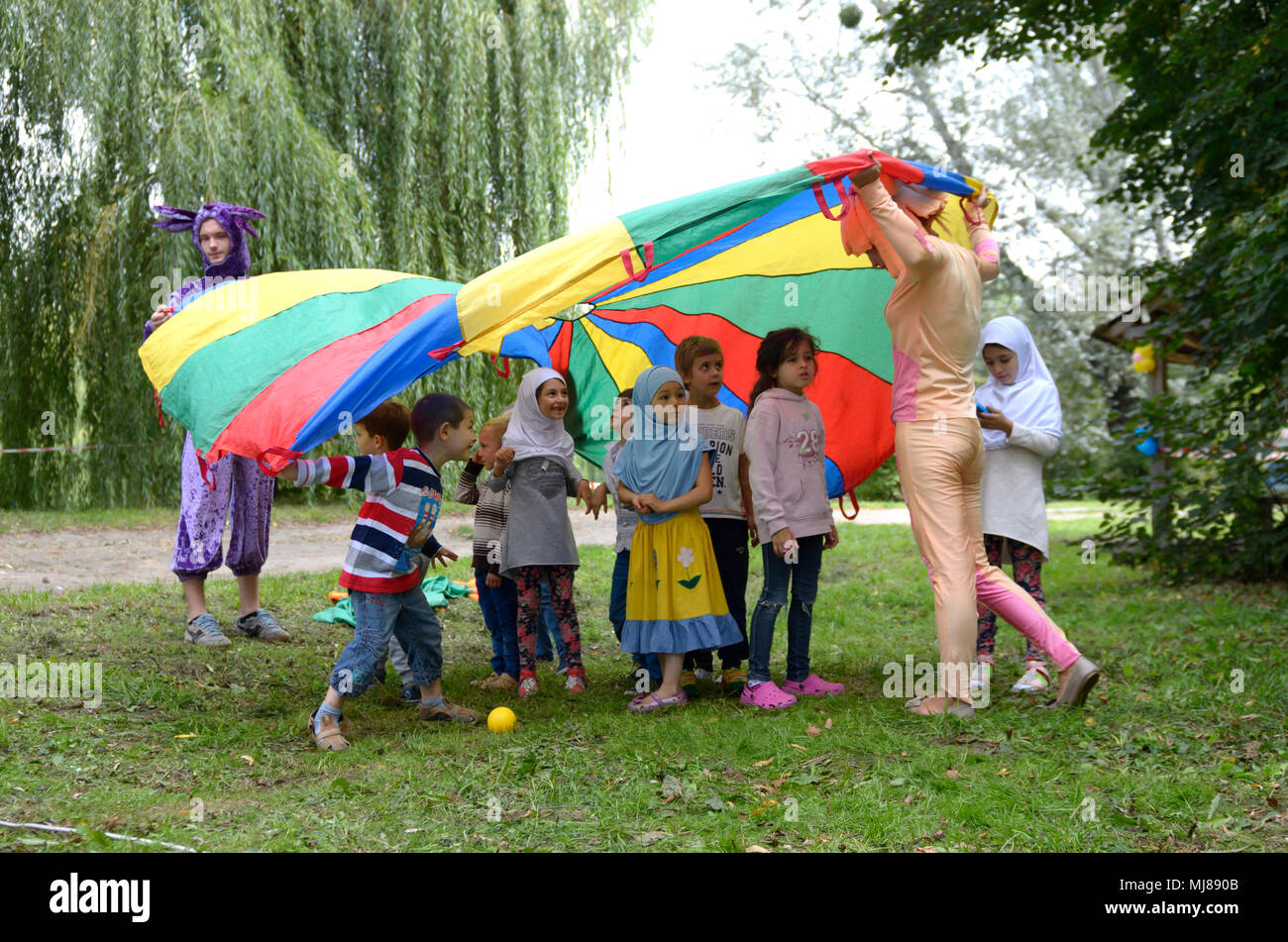 Muslim children playing on a playground. Celebration of Hidirellez ...