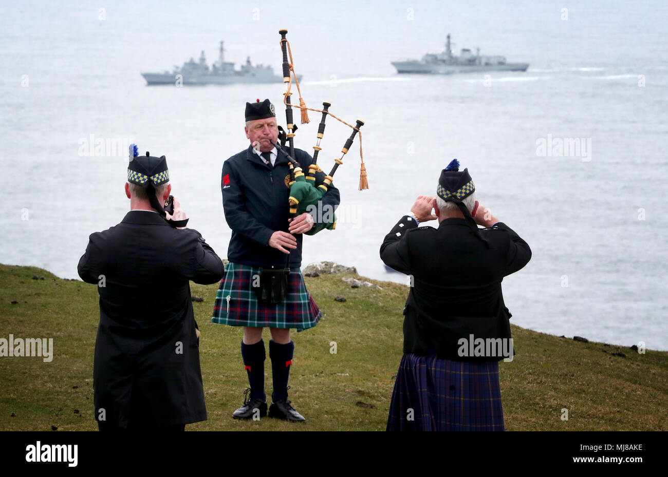 Pipe major Neil MacTaggart, from the Islay Community band, plays during ...