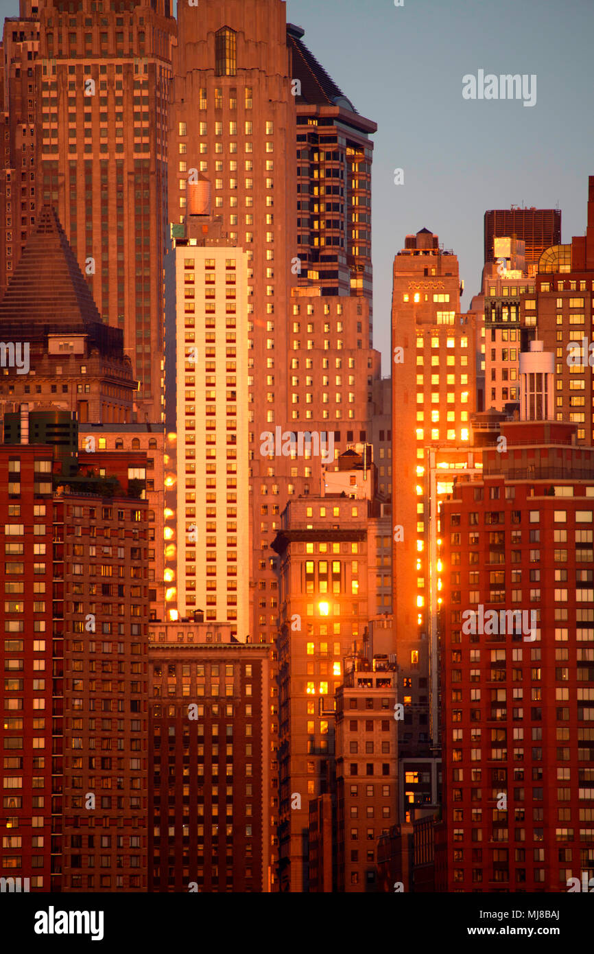 Skyscrapers illuminated by golden sunlight Stock Photo - Alamy