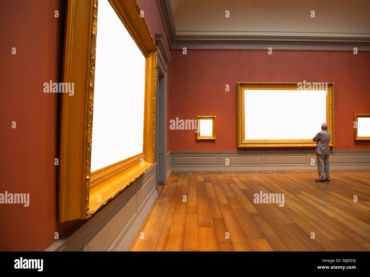 Person looking at picture art gallery hi-res stock photography and ...