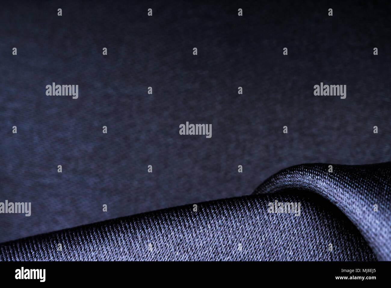 Wave forms of dark polyester fabric texture Stock Photo - Alamy