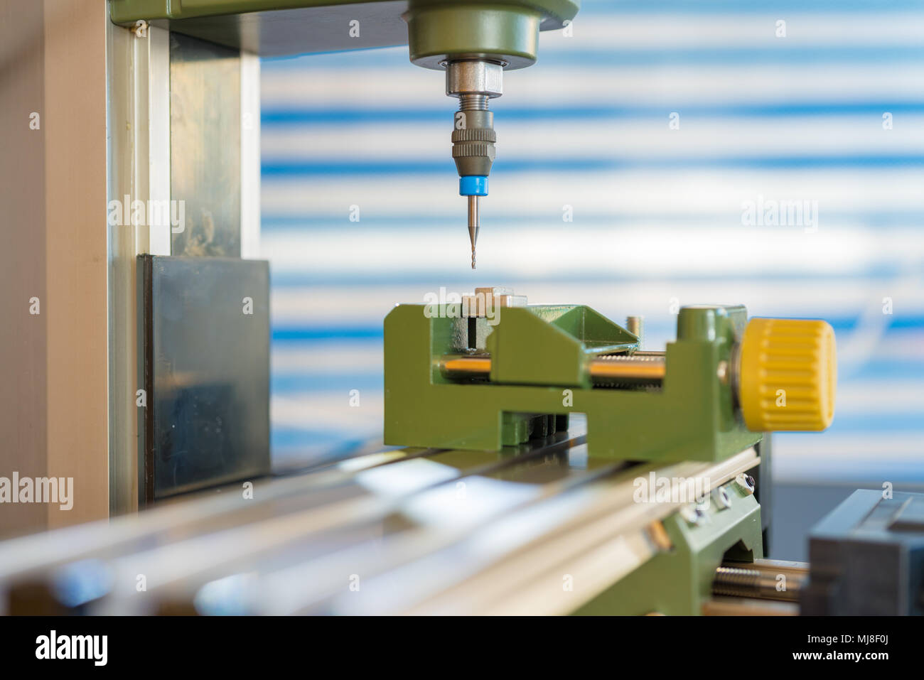 Processing of the plastic workpiece on CNC milling machine Stock Photo ...