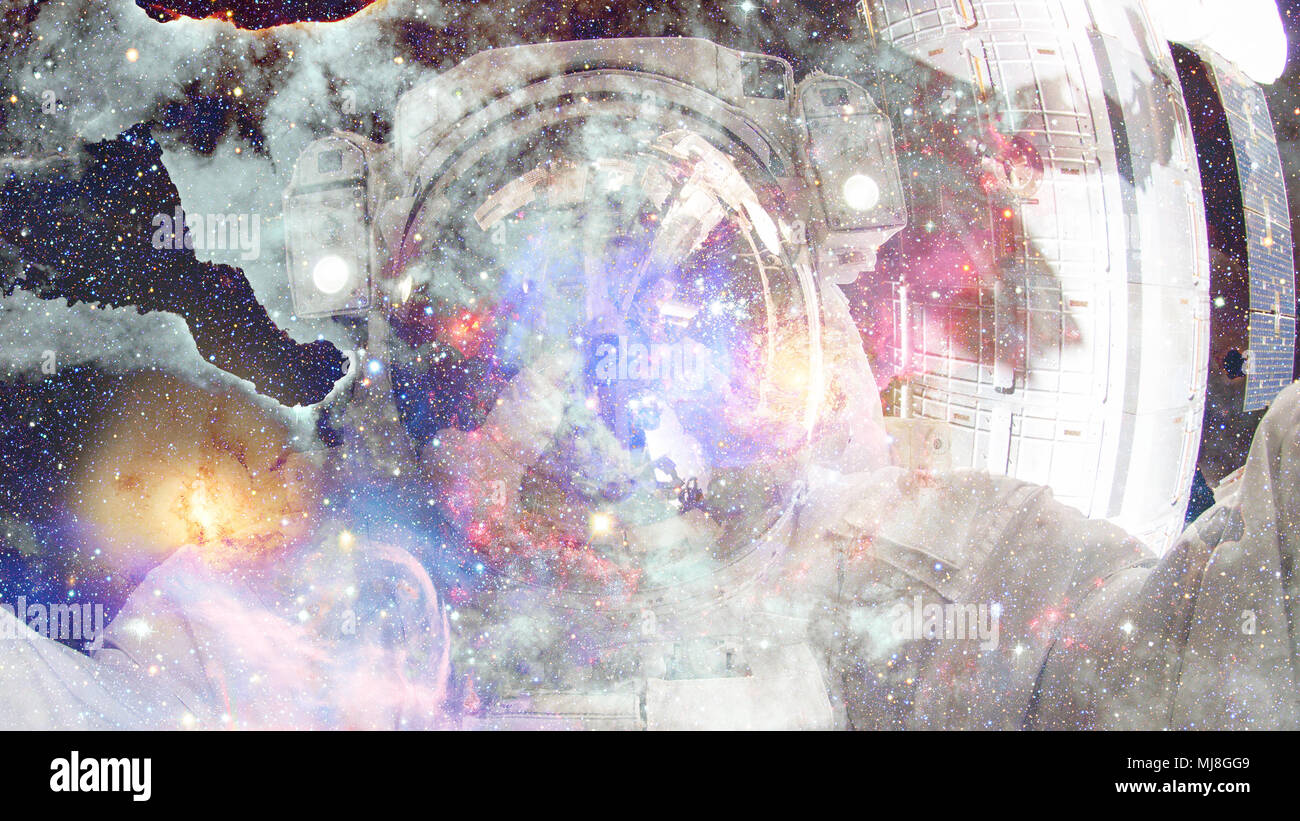 Astronaut in outer space. Science fiction art. Elements of this image ...