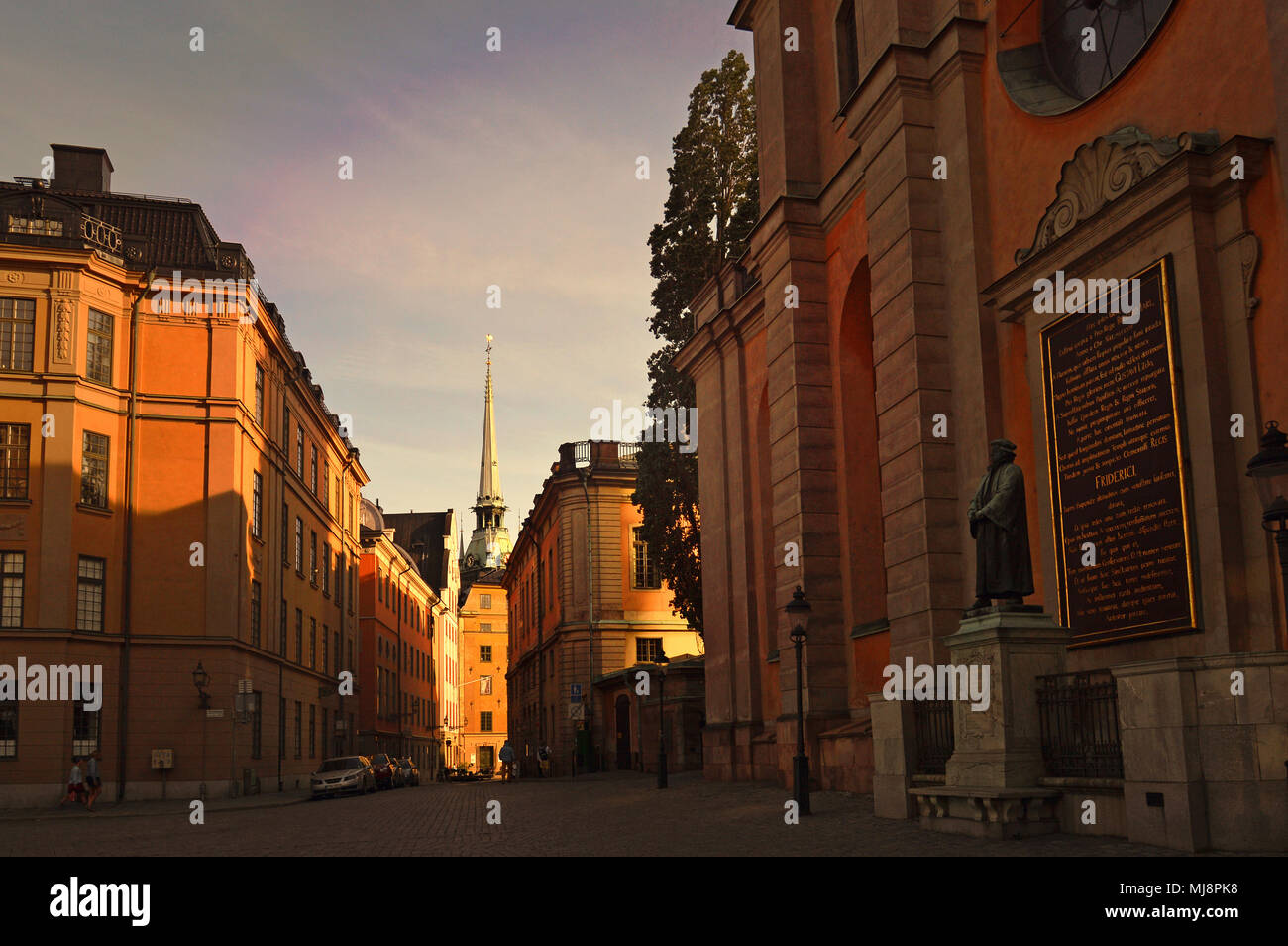 Light and shadow reflects on historic buildings in Gamla Stan, the old ...