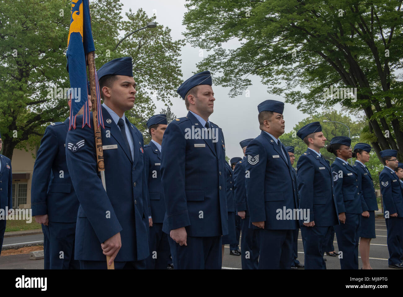 Airmen from the 374th Medical Group stand in formation during an open ...