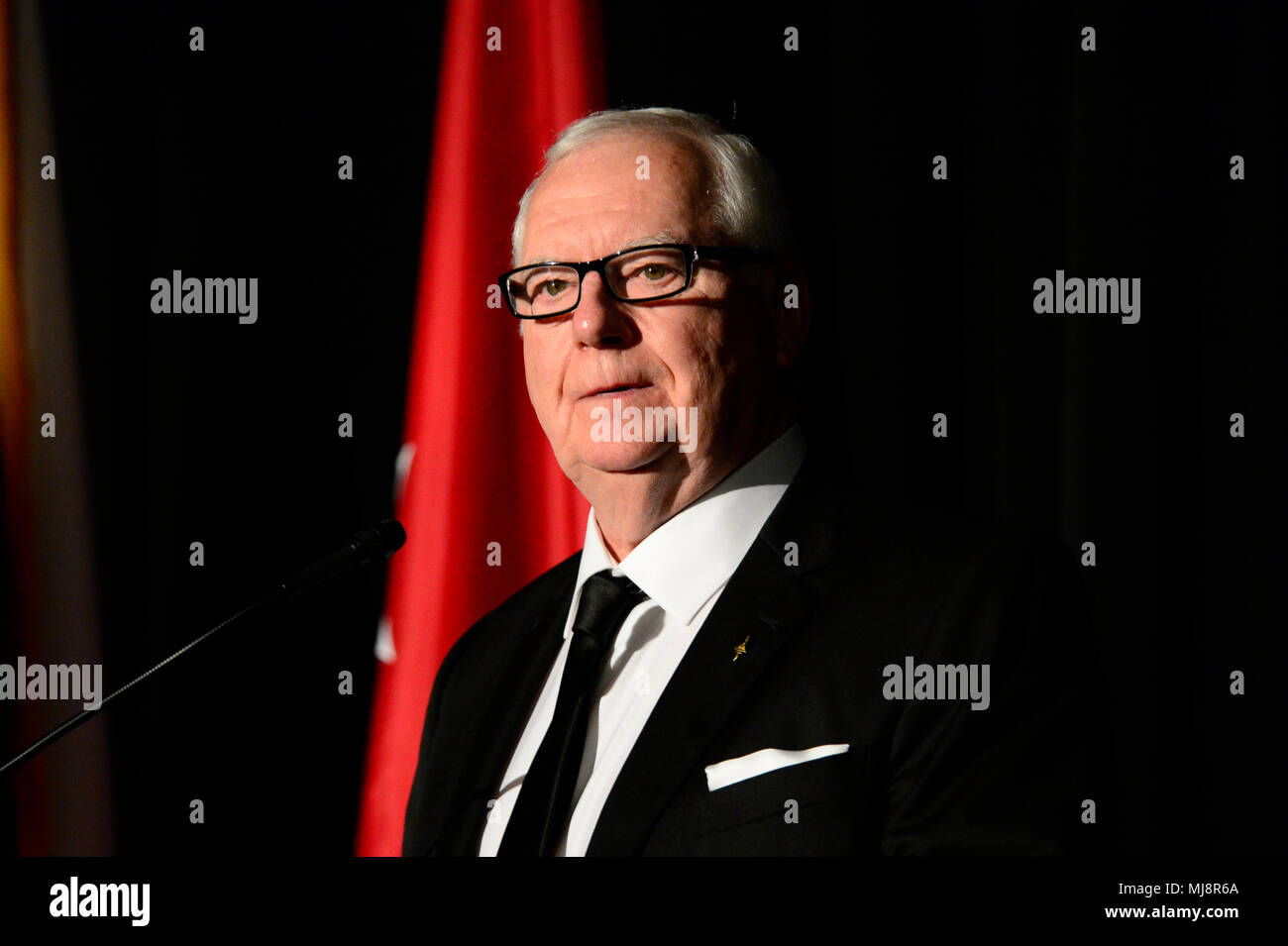 Retired U.S. Army Sgt. Maj. Dennis Wolfe makes remarks after receiving ...
