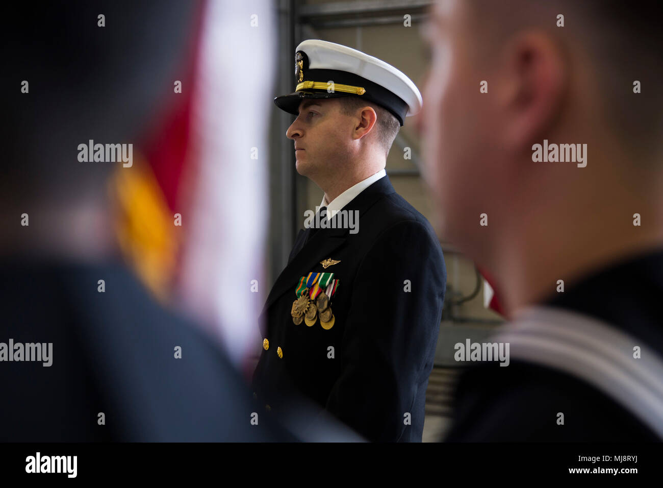 U.S. Navy Lt. Cmdr. Ryan Frantz, the announcer for the Strike Fighter Squadron (VFA) 195 change ...