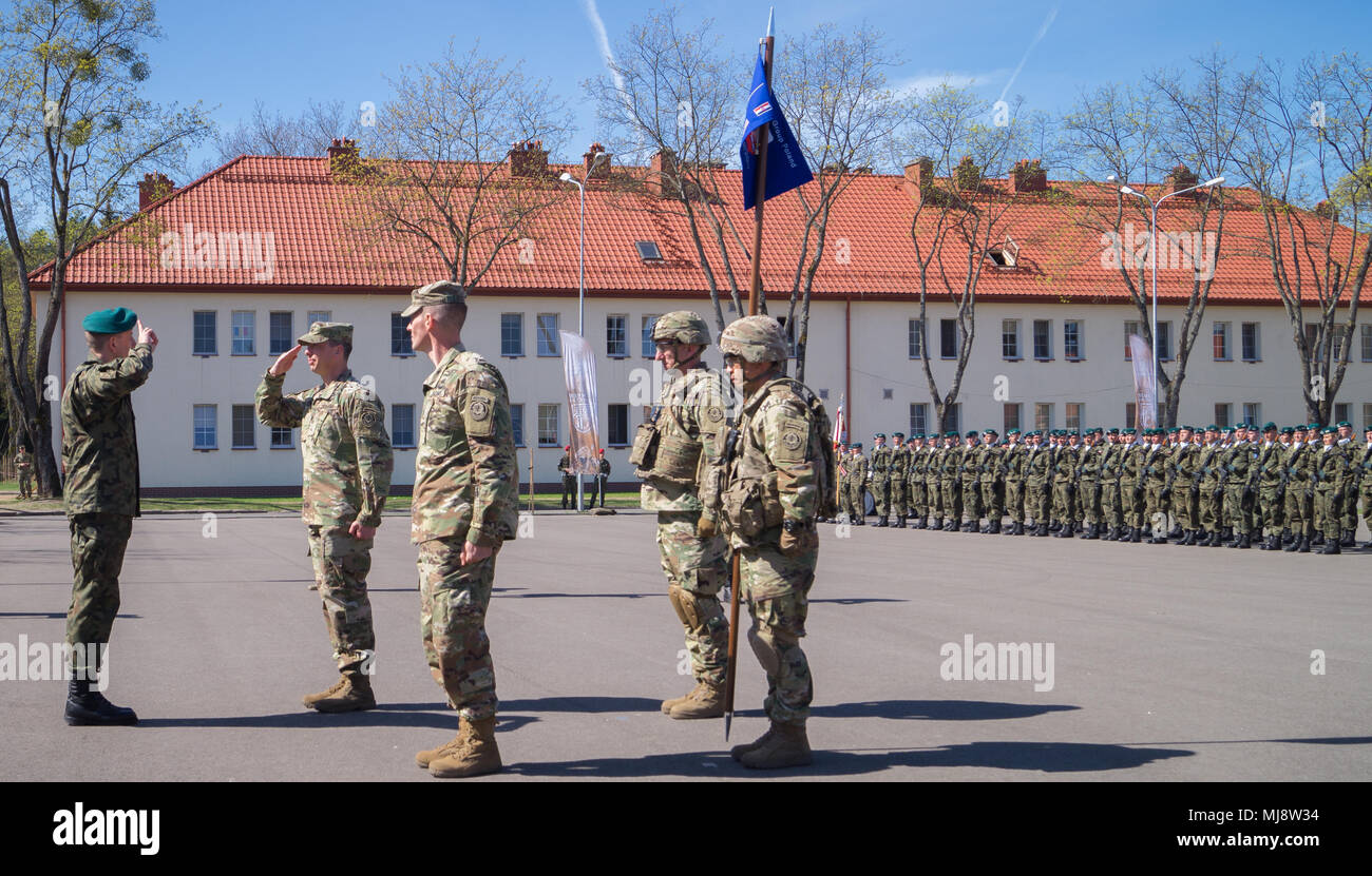 The outgoing commander and incoming commander perform the time honored ...