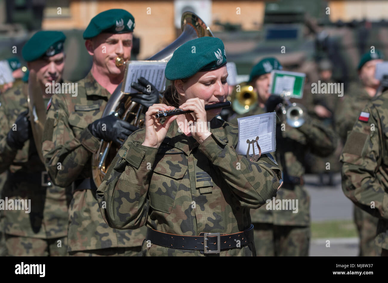 A Polish military band plays the ceremonial music during the transfer ...