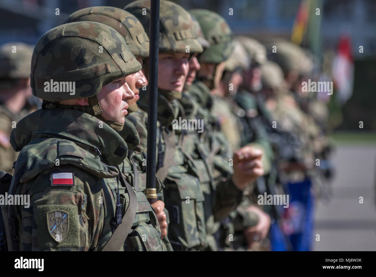The soldiers of Battle Group Poland stand in formation as they ...