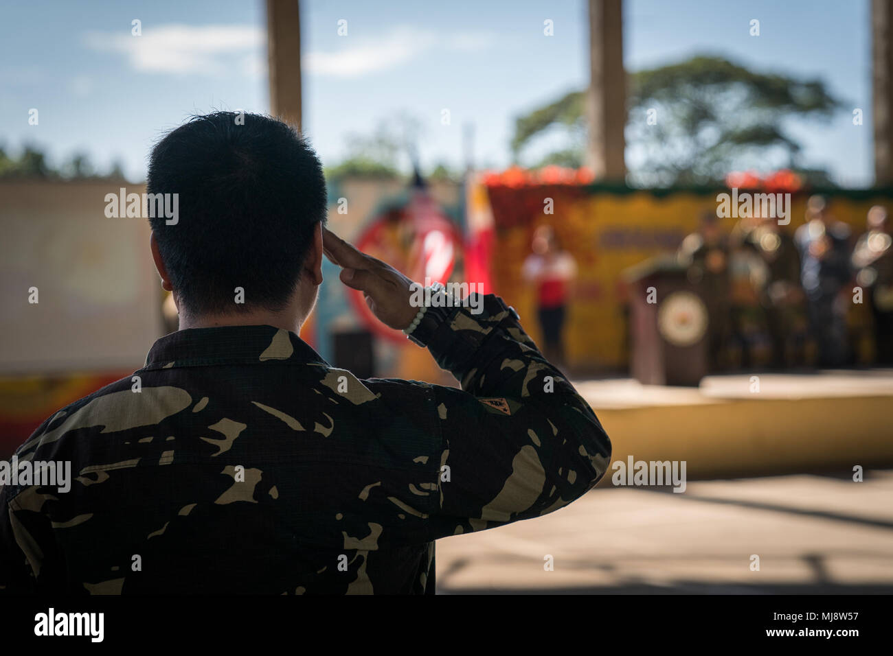 A Philippine Army soldier salutes for the Republic of the Philippines ...