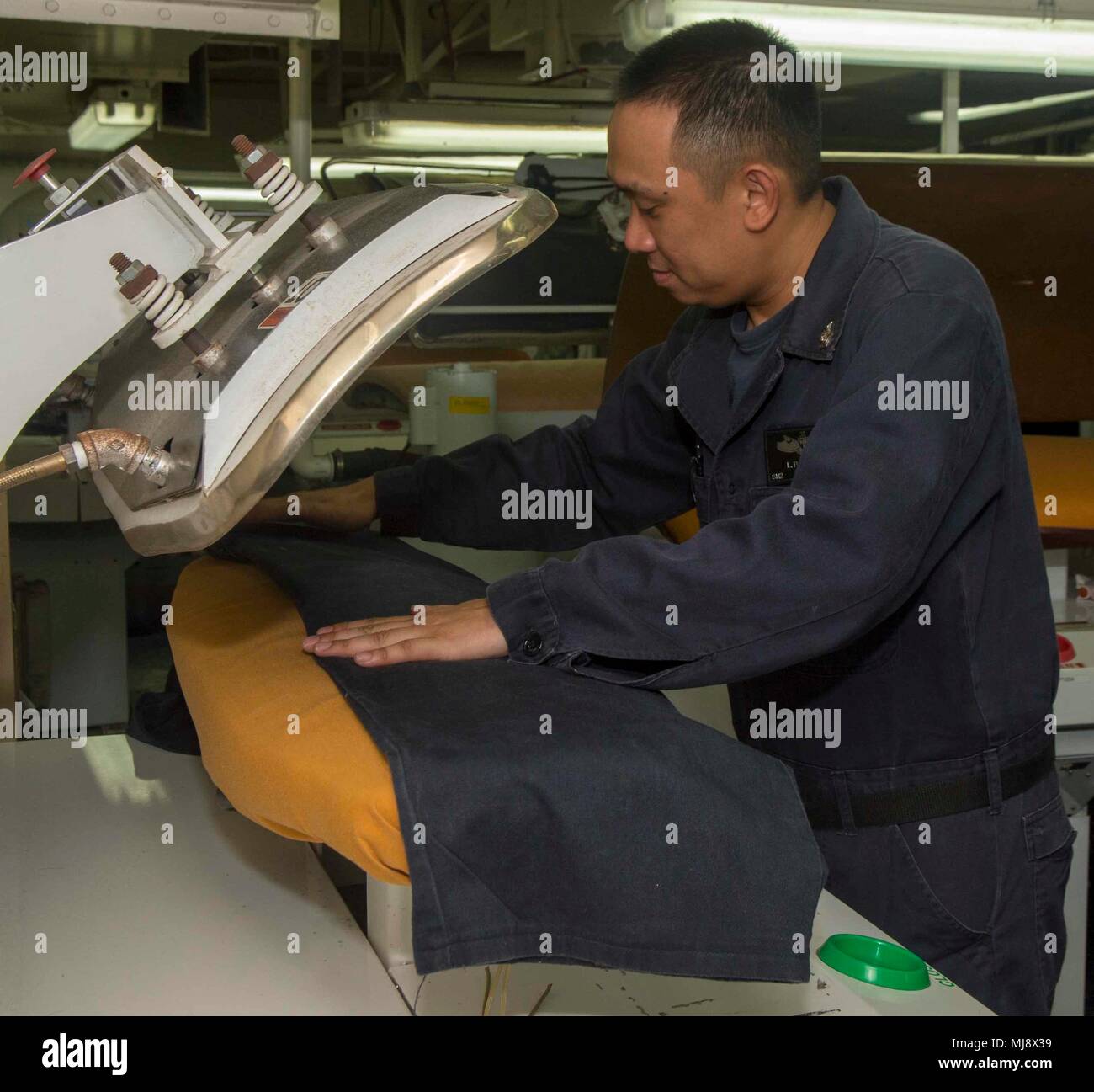 Laundry presses hi-res stock photography and images - Alamy