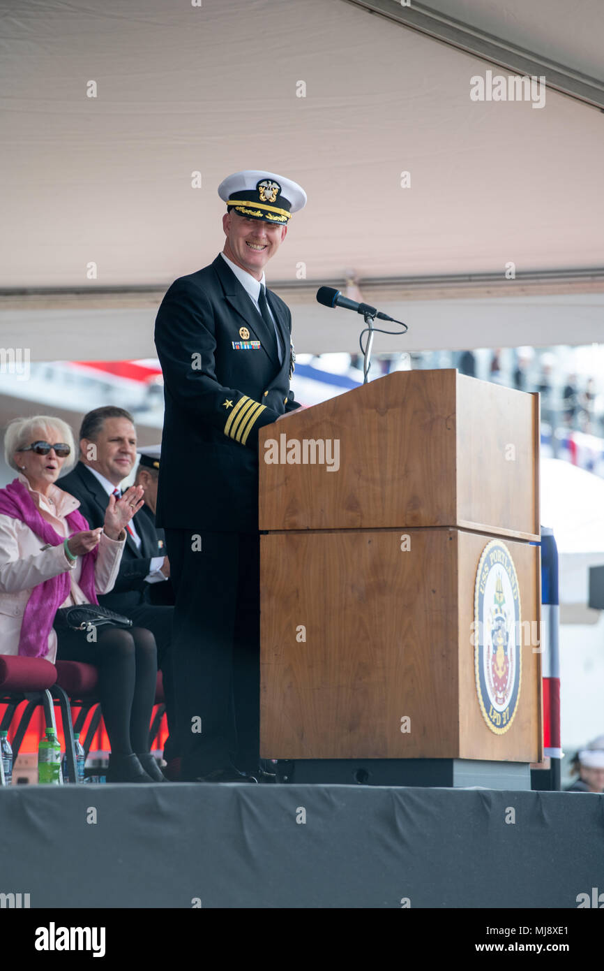 U.S. Navy Capt. Jeremy R. Hill, commanding officer of the USS Portland ...