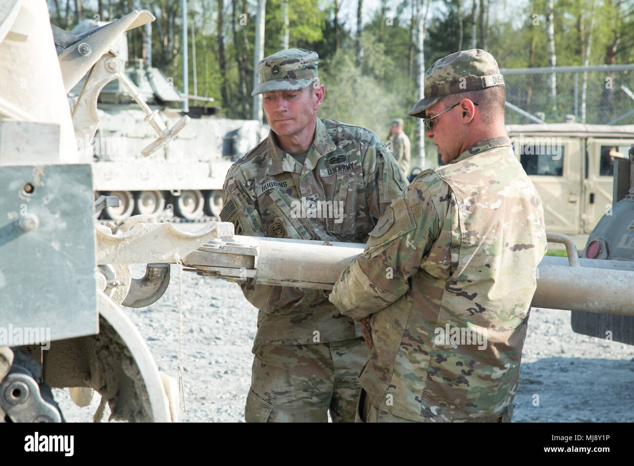 U.S. Army Sgt. 1st Class Daymon Huggins and Pfc. Chance Duggins, both ...