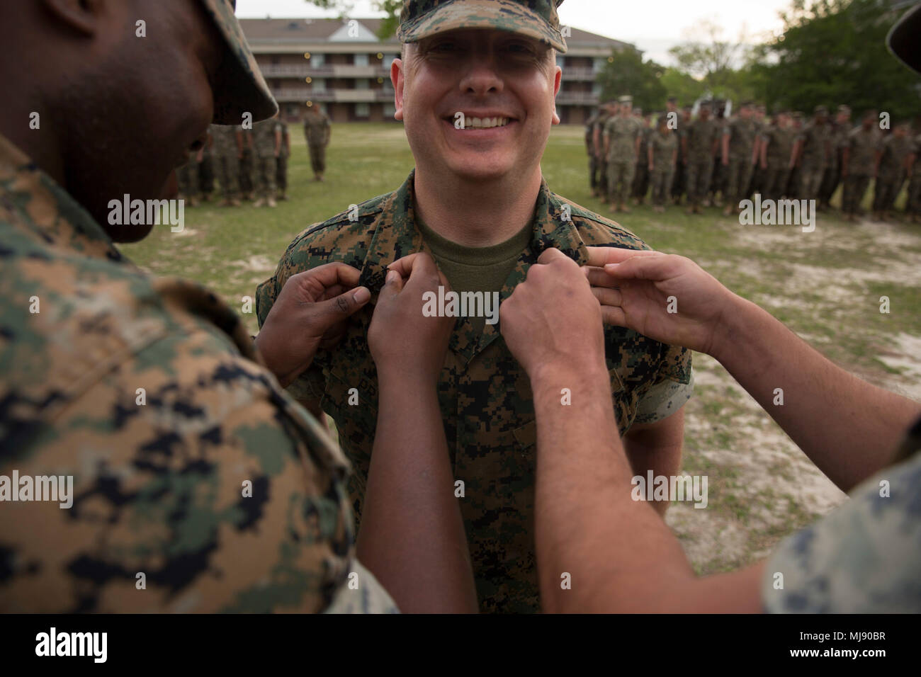 U.S. Marine Corps Col. Michael Oppenheim, left, SPMAGTF-SC commanding ...