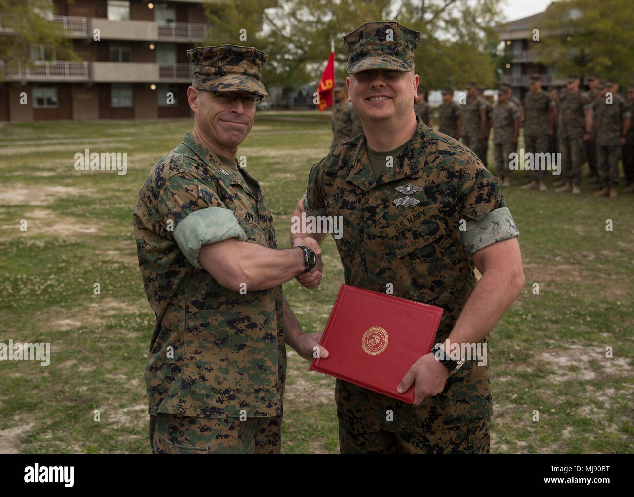 U.S. Marine Corps Col. Michael Oppenheim, left, SPMAGTF-SC commanding ...