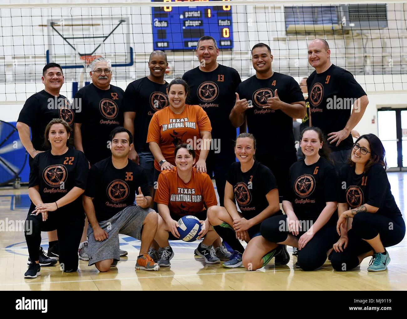 Members of the 149th Fighter Wing Gunfighter volleyball team pose for a ...