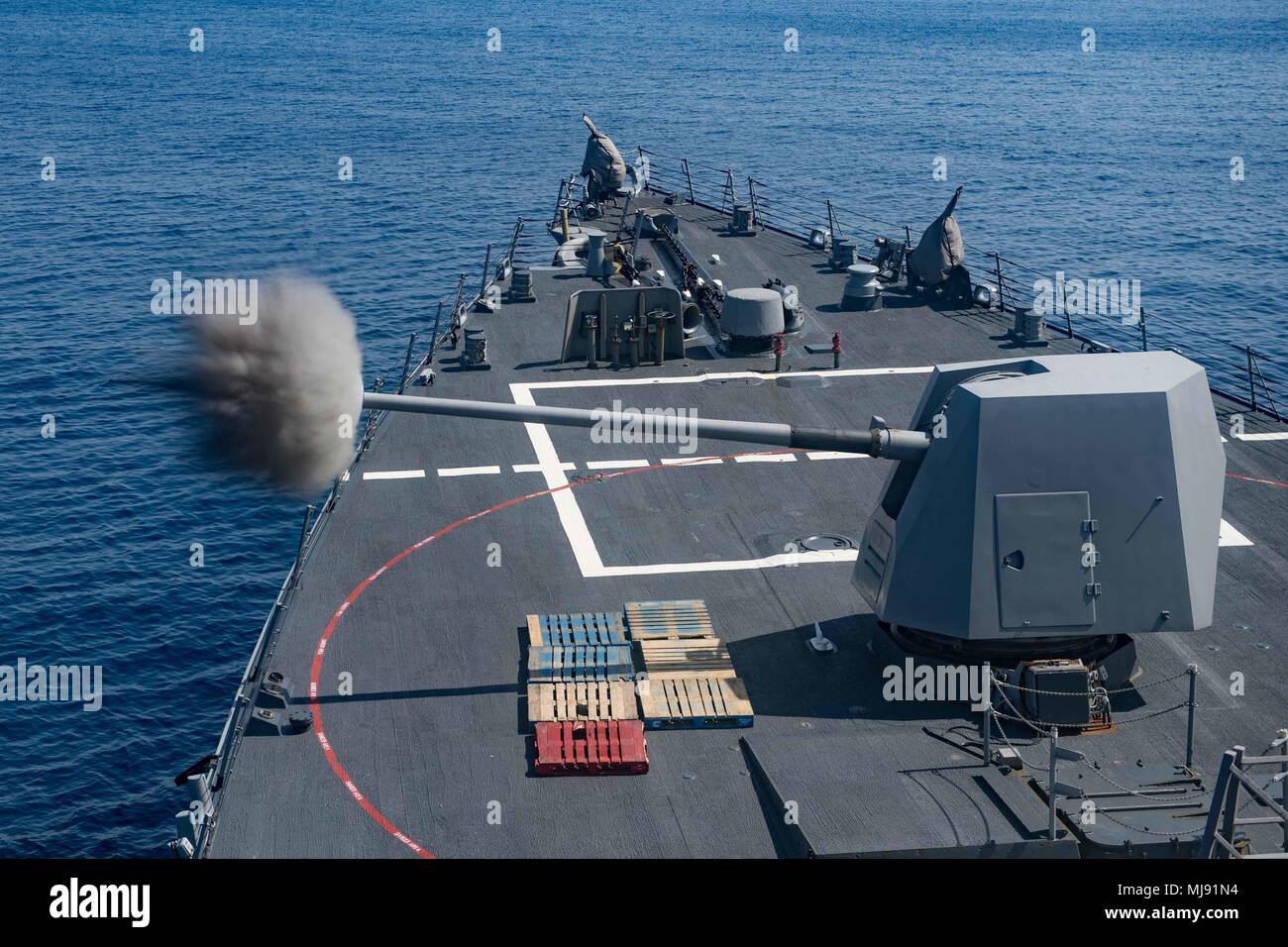 The guided-missile destroyer USS Winston S. Churchill (DDG 81) fires a ...