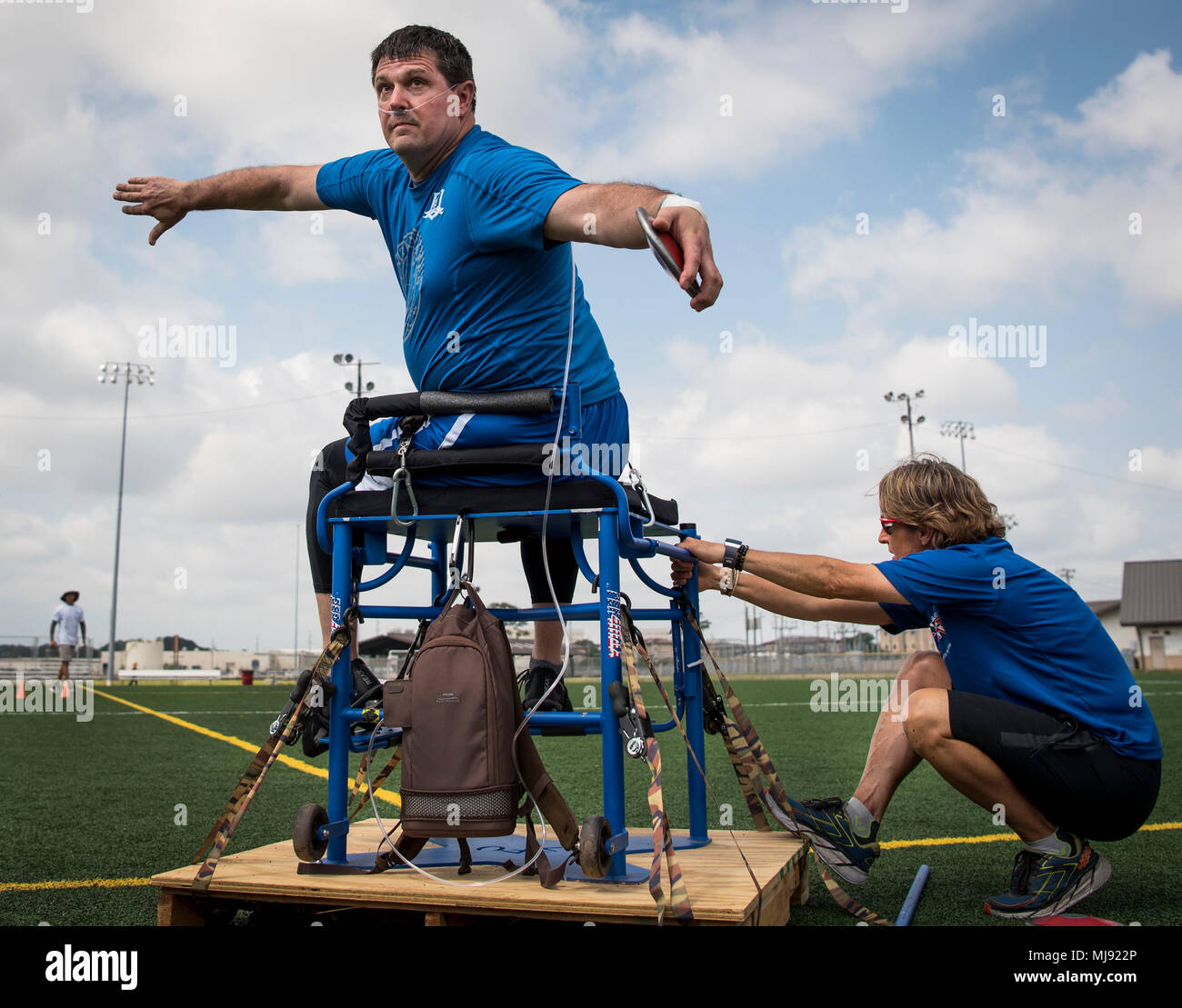 John Angel, a Warrior Games athlete, goes into his discus rotation ...