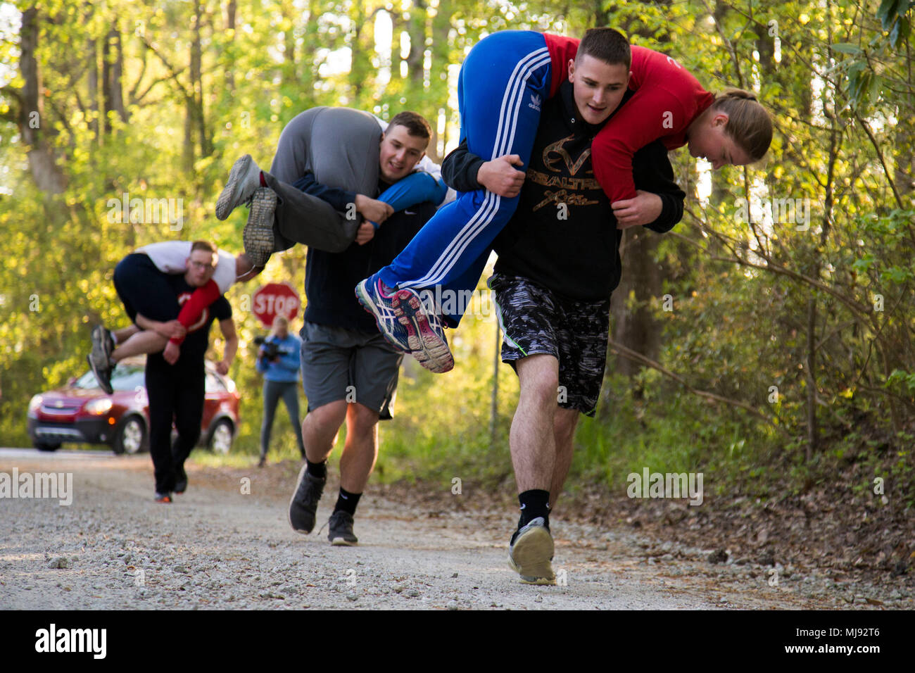 Fireman carry hi-res stock photography and images - Alamy