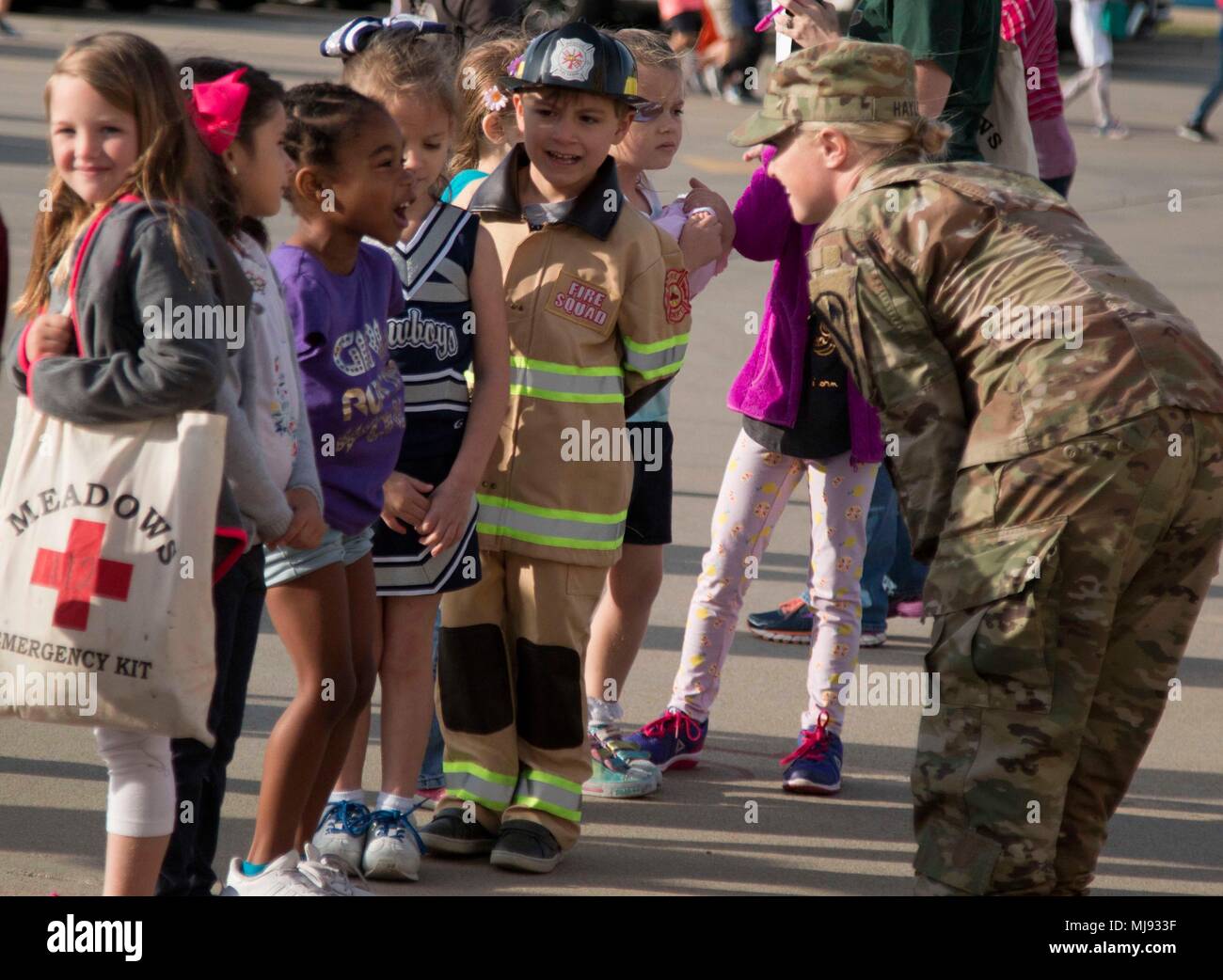 2nd Lt. Allyson Hayley, platoon leader, 2-82 FA, talks with a Meadows ...
